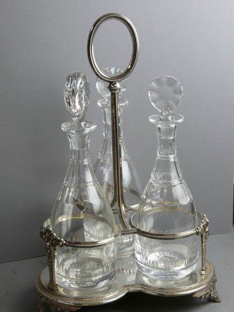 E.P. SILVER THREE BOTTLE DECANTER STAND WITH THREE MATCHING DECANTERS ...